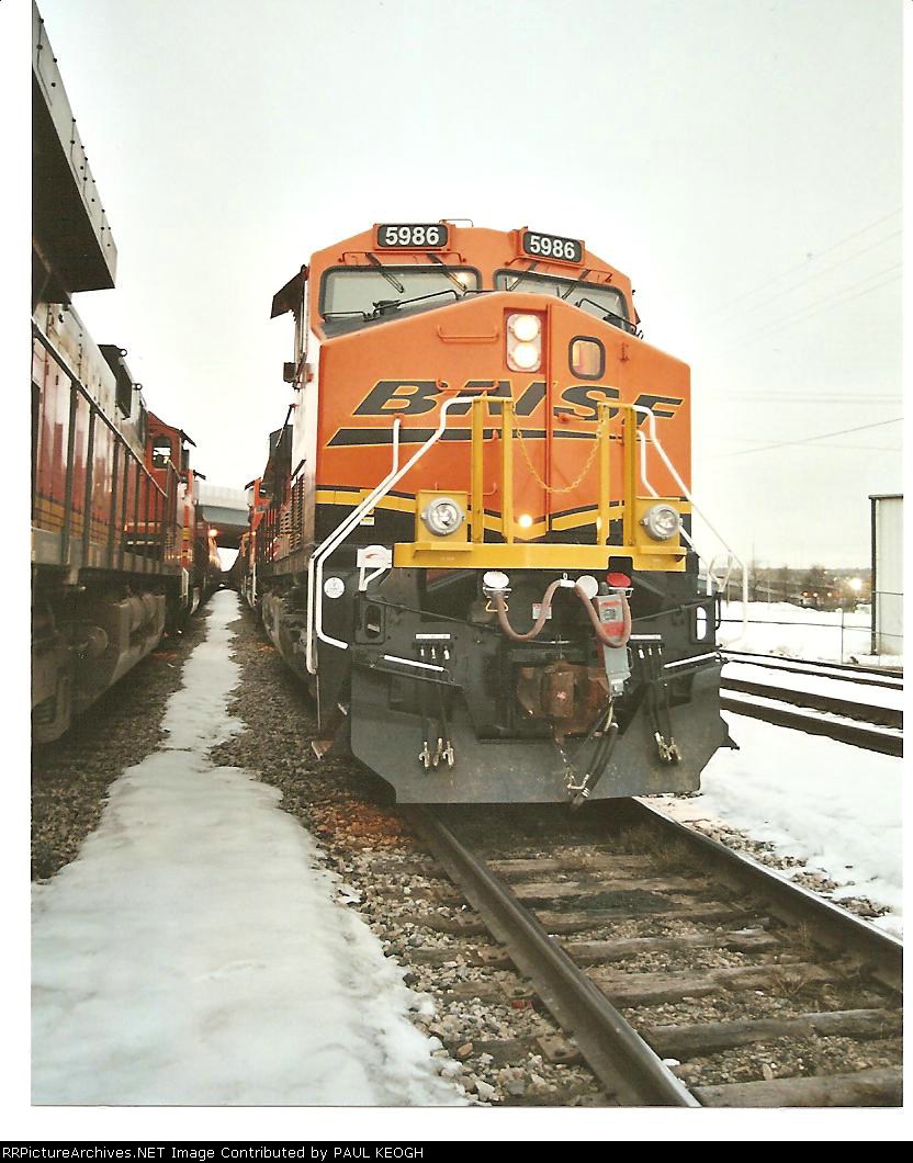 BNSF 5986 rear DPU on a loaded southbound coal train